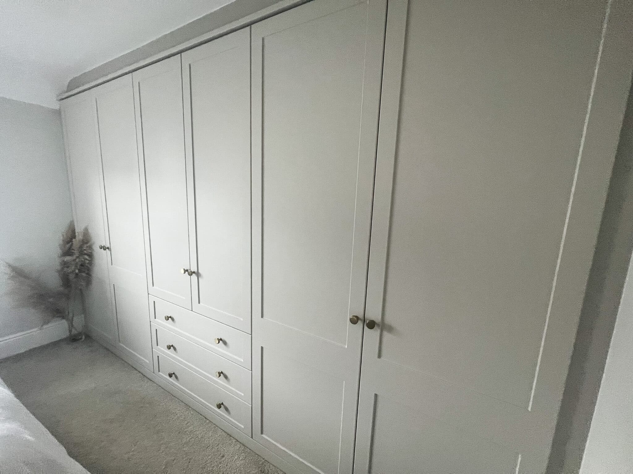 Sleek and refined storage with a cleverly concealed surprise - Fitted ...